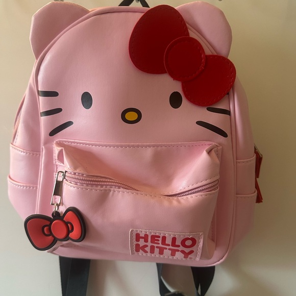Hello Kitty | Accessories | Hello Kitty Pink And Red Metallic Bag With ...